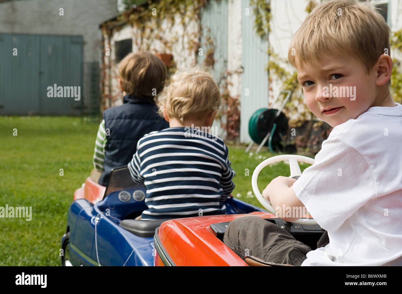 Children with toy cars Stock Photo - Alamy