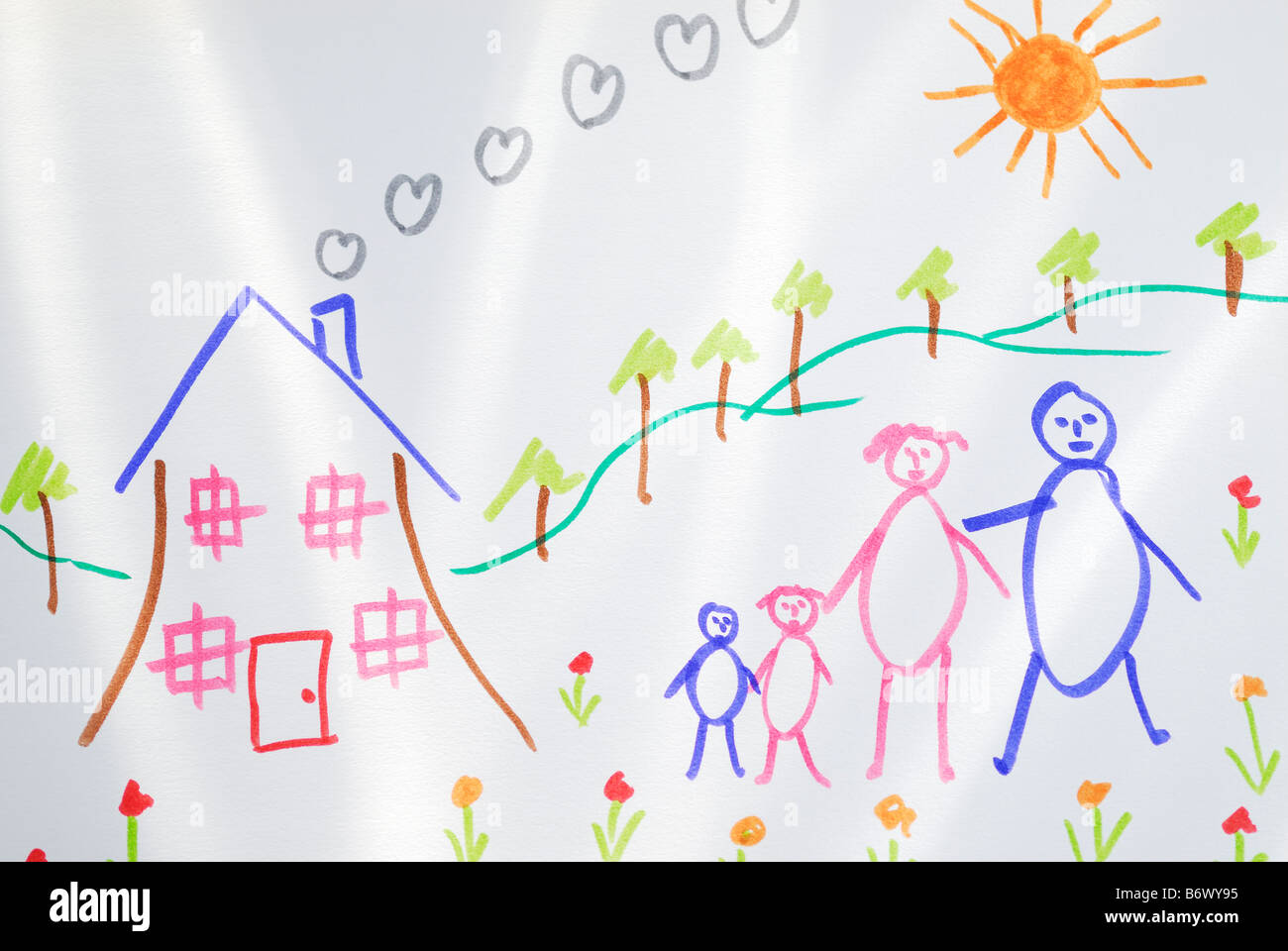 Childlike drawing of a house and family Stock Photo - Alamy