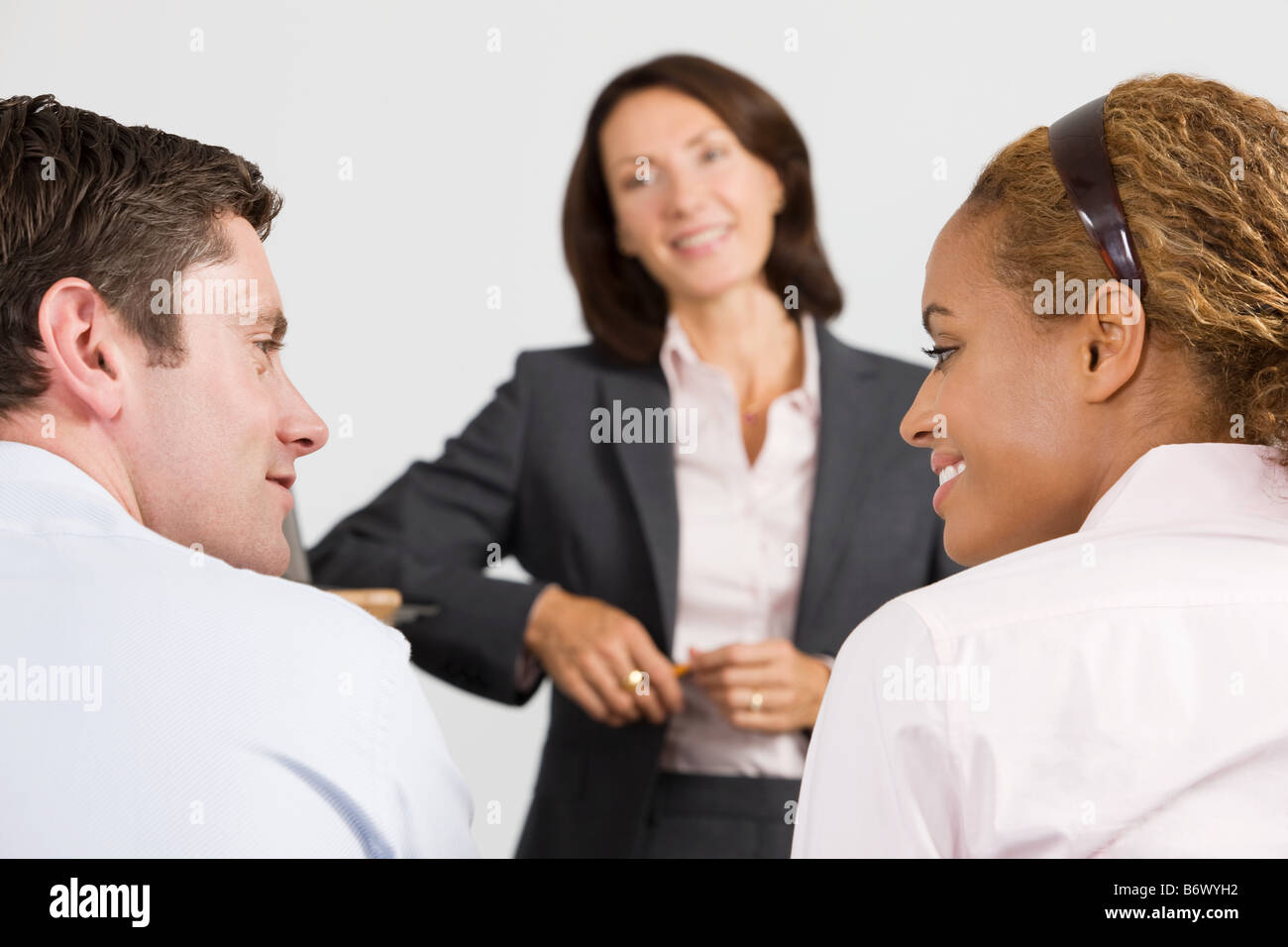 Teaching trio hi-res stock photography and images - Alamy