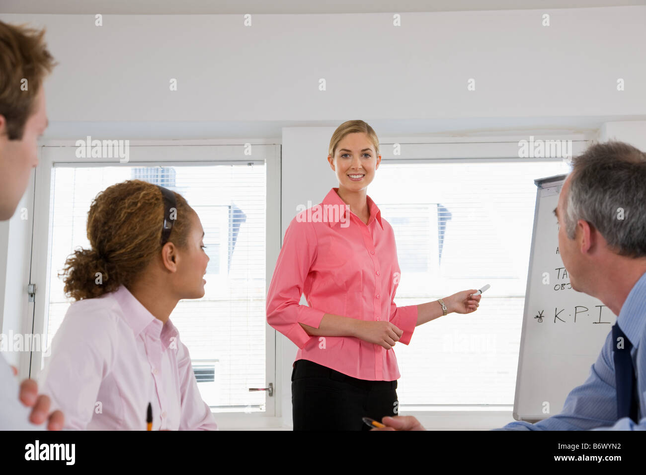 A lecturer teaching business students Stock Photo - Alamy