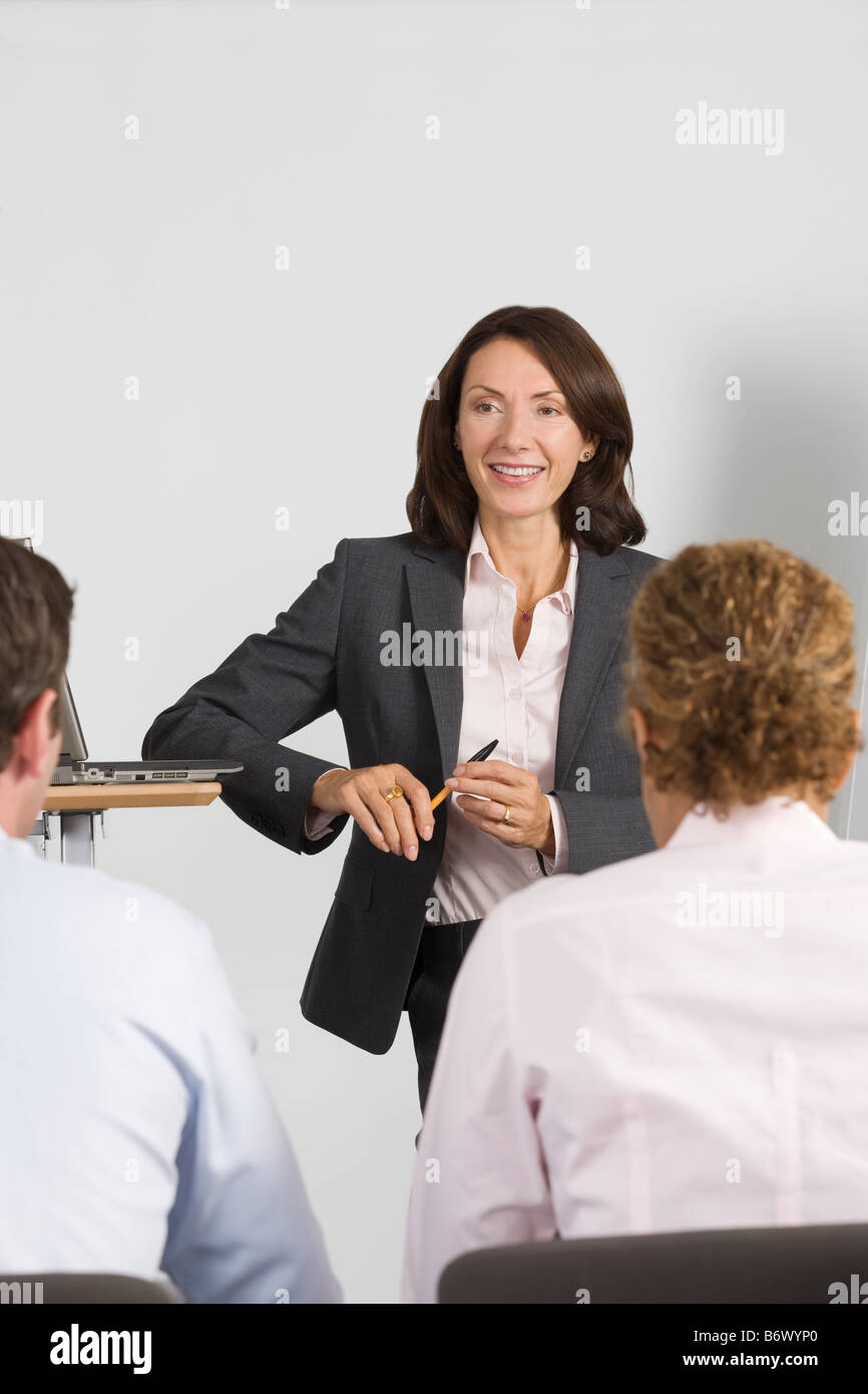 A lecturer teaching business students Stock Photo - Alamy