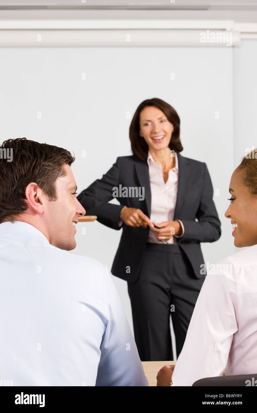 A lecturer teaching business students Stock Photo - Alamy