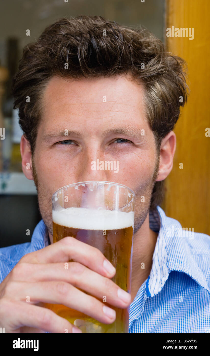 Man drinking beer Stock Photo - Alamy