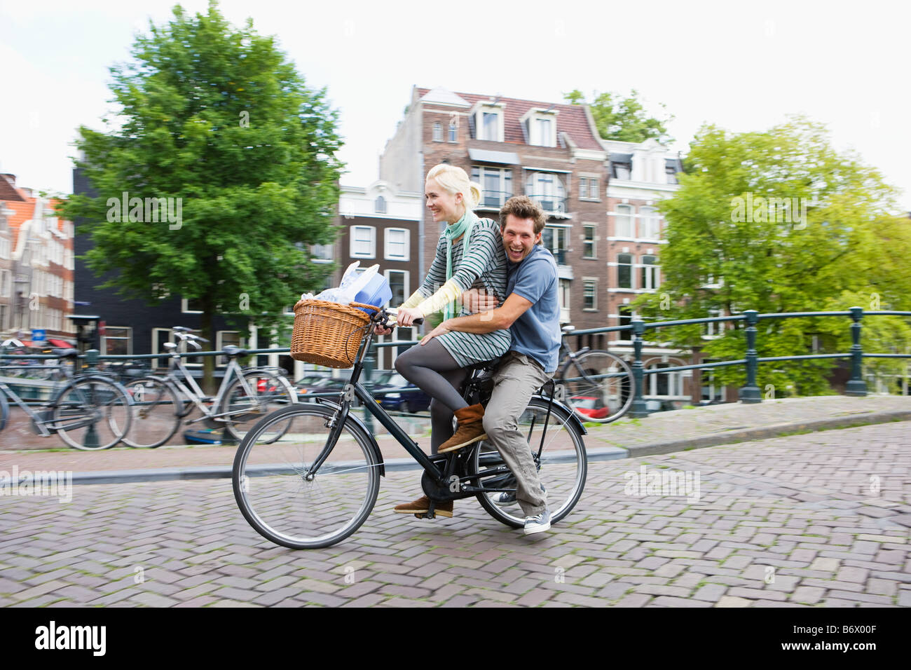 Couple on bicycle Stock Photo - Alamy
