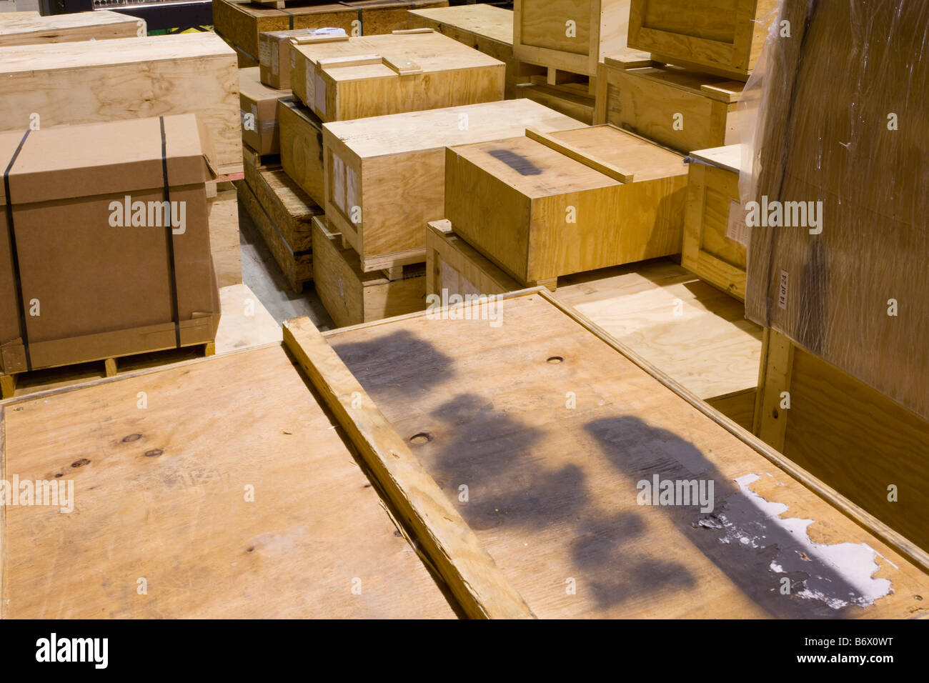 Crates in a warehouse Stock Photo - Alamy