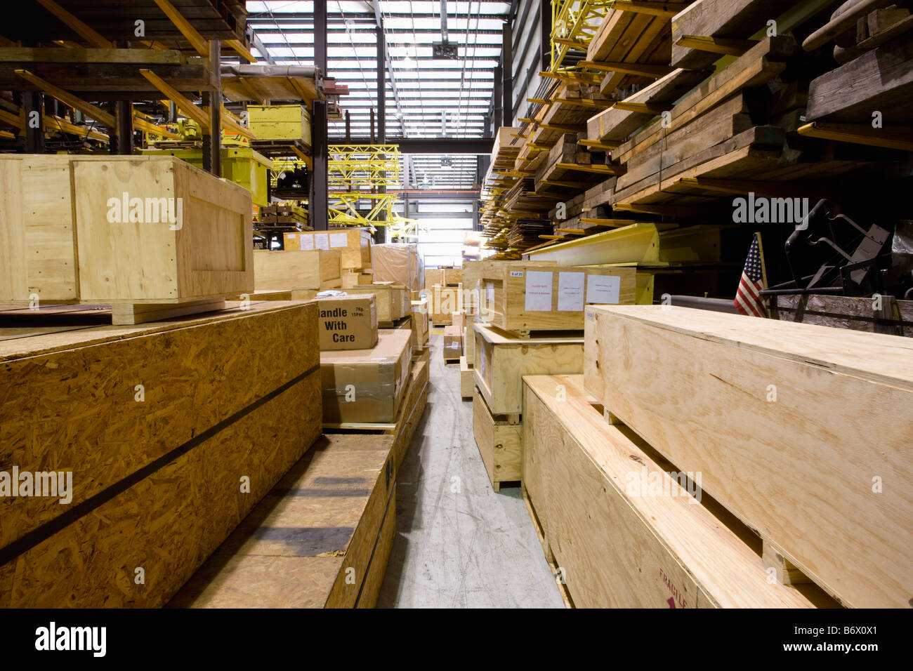 Crates in a warehouse Stock Photo - Alamy