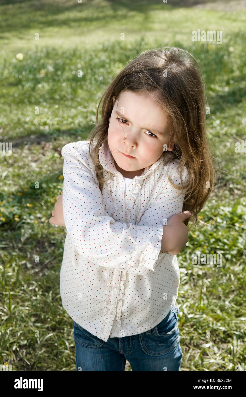 Little girl sulking Stock Photo - Alamy