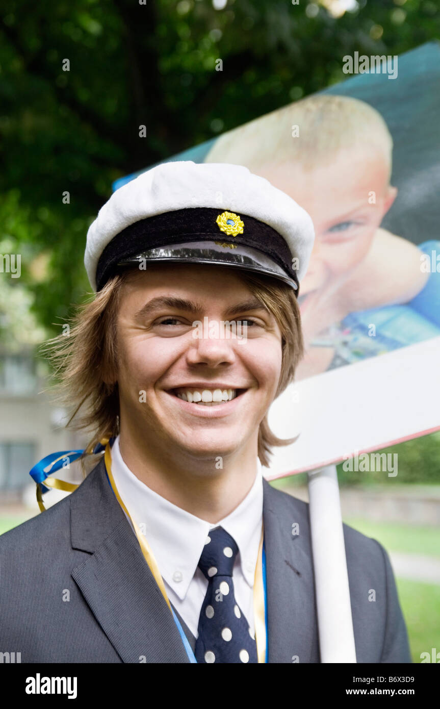 Male student with sign Stock Photo - Alamy