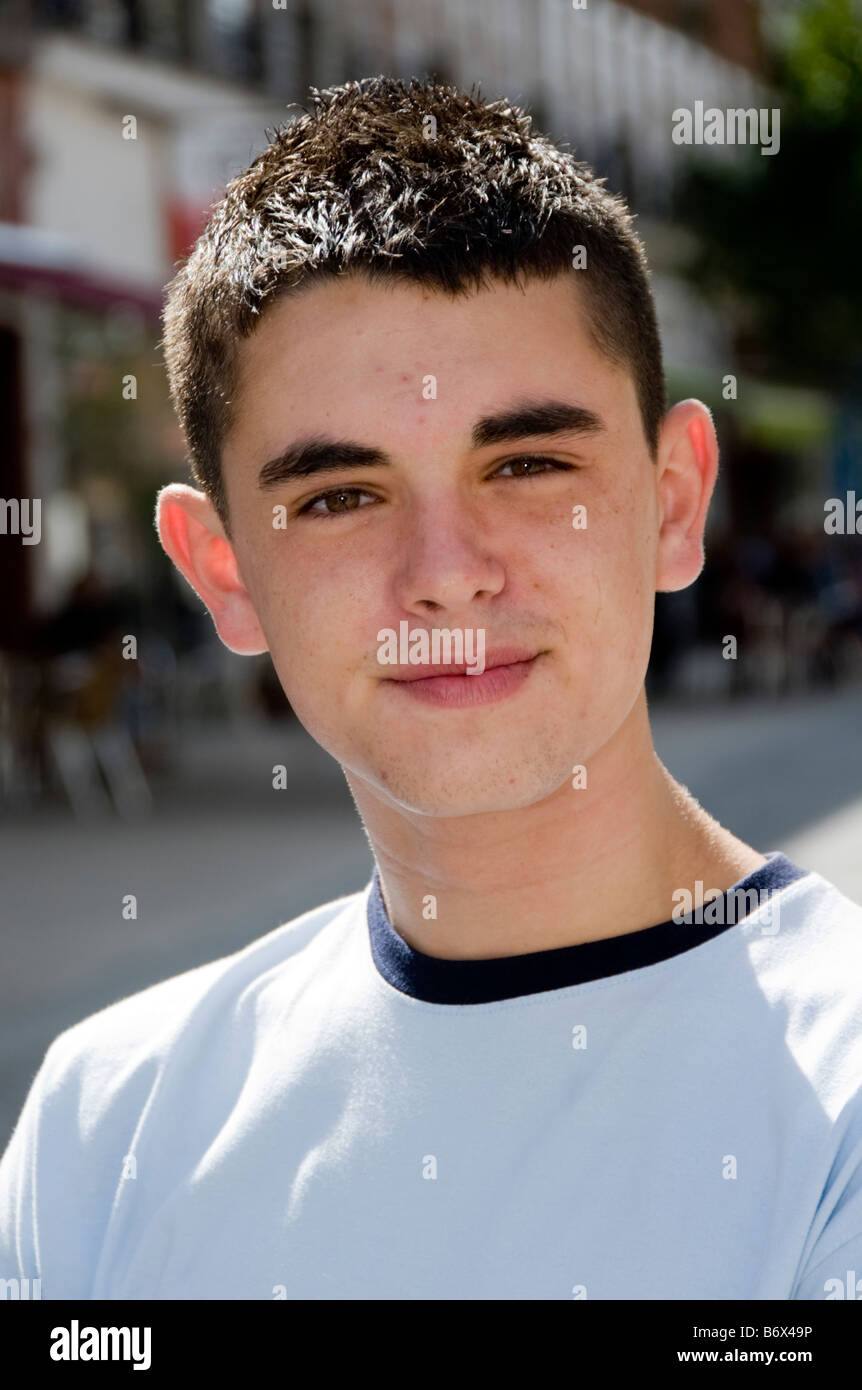portrait of teenage boy looking into camera Stock Photo - Alamy