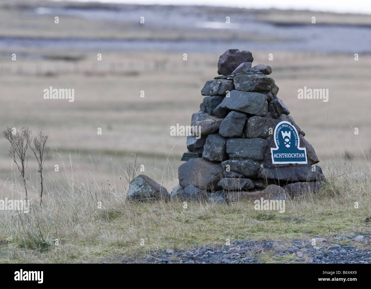 stone mounted roadside sign in the valley of Glencoe just before ...