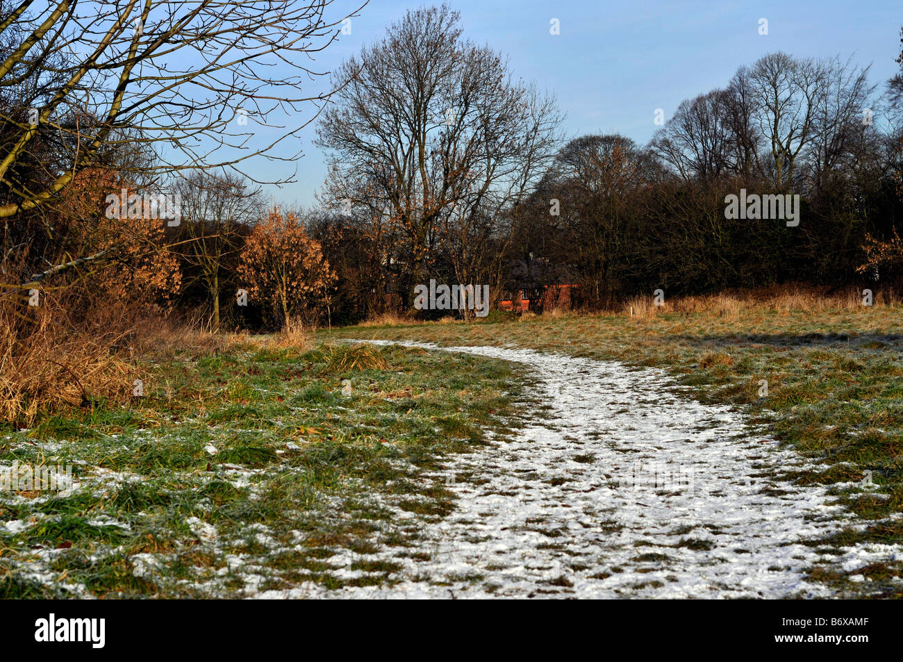 fletcher moss field slightly covered with snow Stock Photo - Alamy