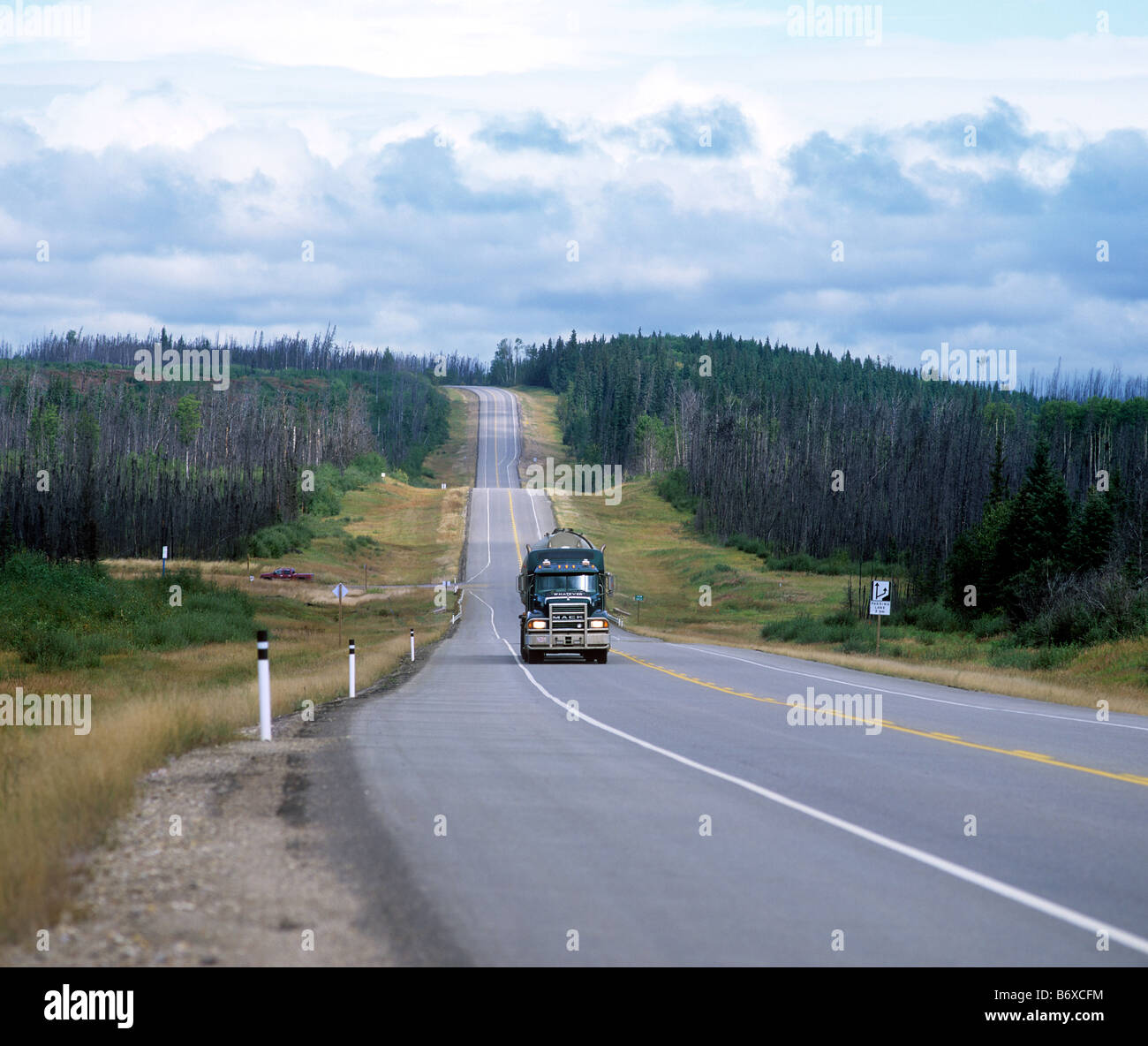 A truck heading south on Highway 63, between Fort McMurray and ...