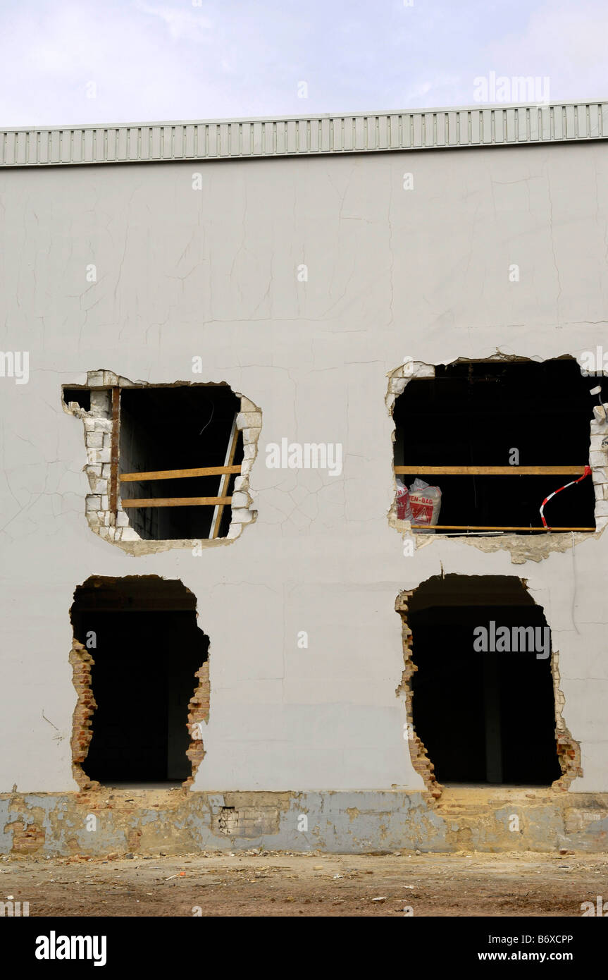 demolition preparation building damaged bricks holes windows opening ...