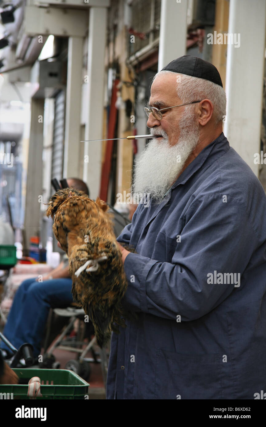 A shohet in an Israeli market (a kosher butcher Stock Photo - Alamy
