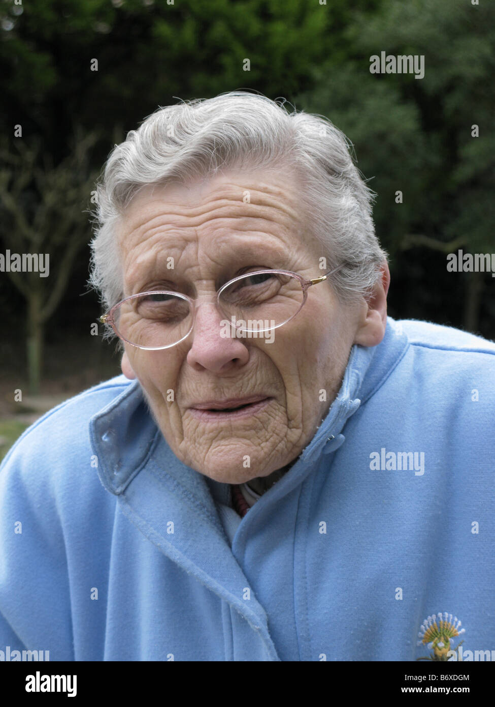 elderly woman feeling very cold due to freezing temperatures Stock ...