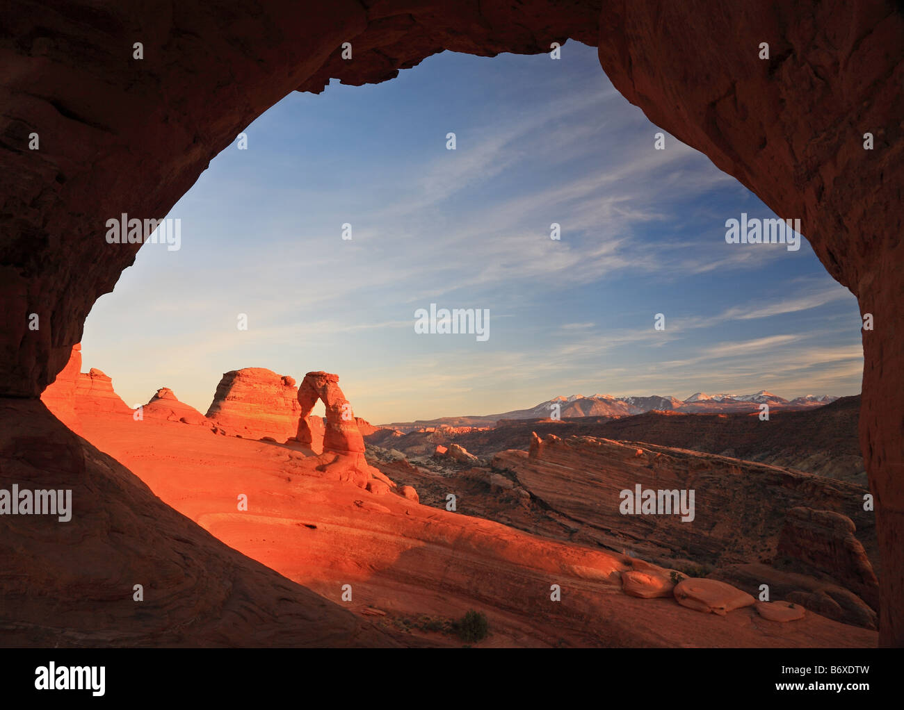 Delicate Arch as seen through another arch in Arches National Park ...
