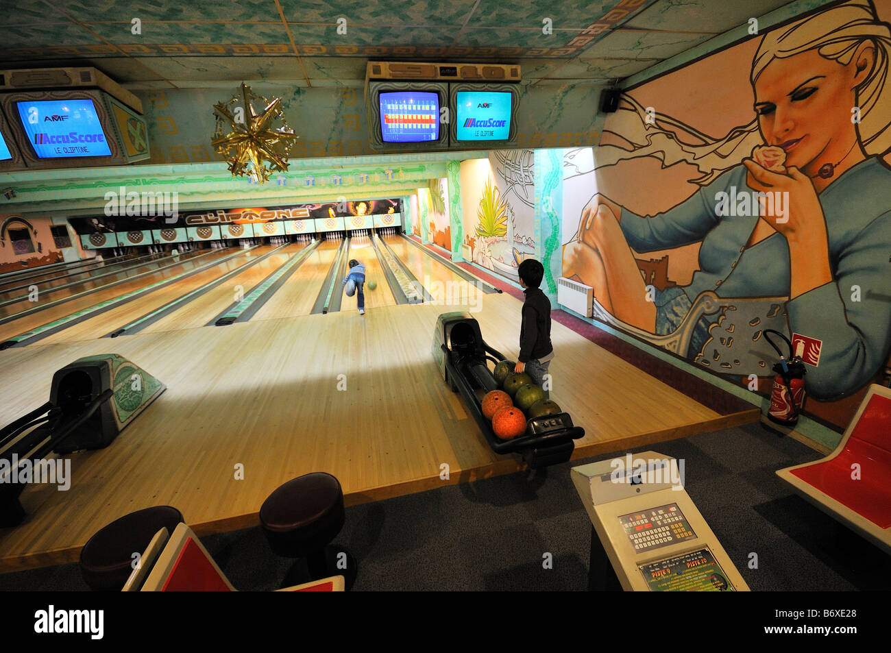 France Coignieres town, young boys playing bowling Stock Photo - Alamy