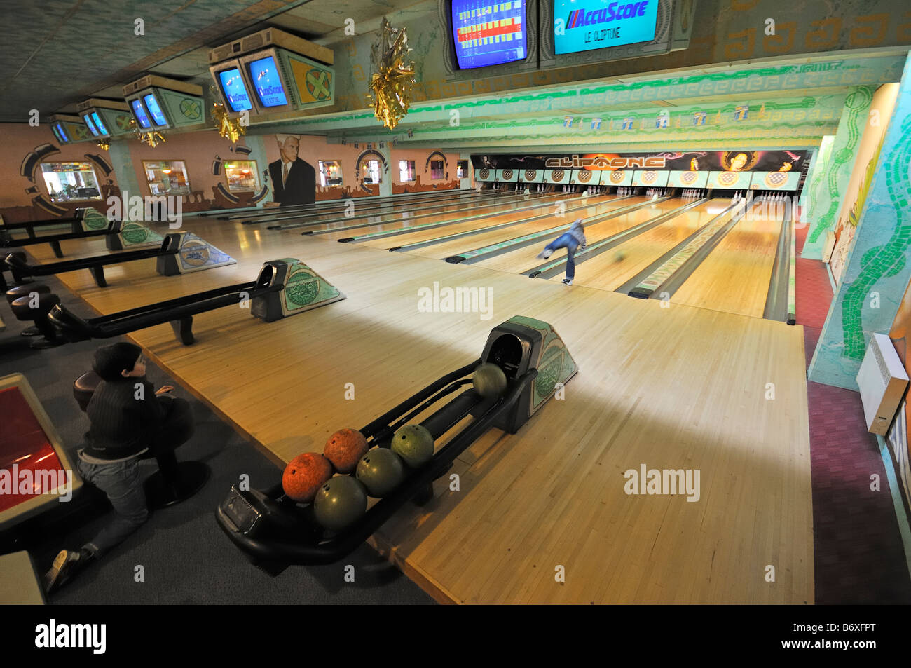 France Coignieres town, young boys playing bowling Stock Photo - Alamy