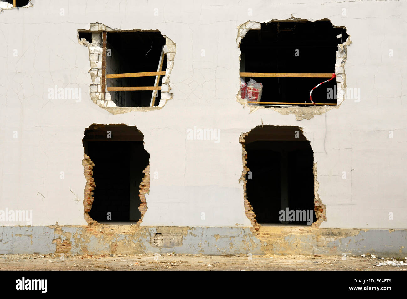 demolition preparation building damaged bricks holes windows opening ...