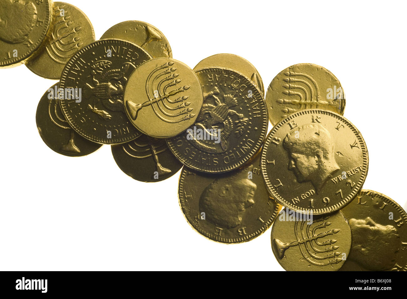 Hanukkah gelt with menorah on back isolated on white Stock Photo - Alamy