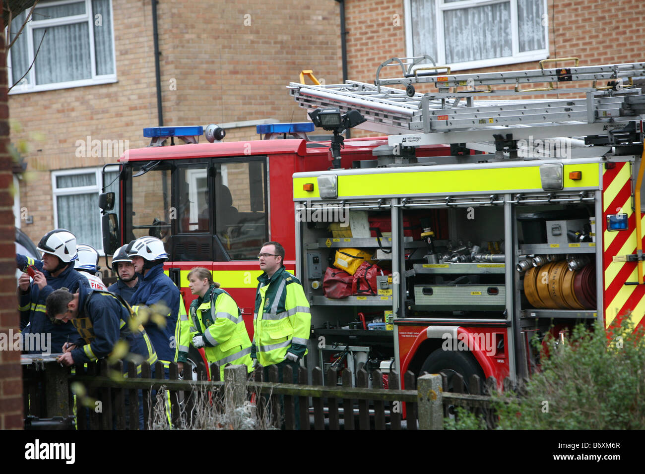fireman fighting a fire in a block of flats in hertfordshire uk Stock ...
