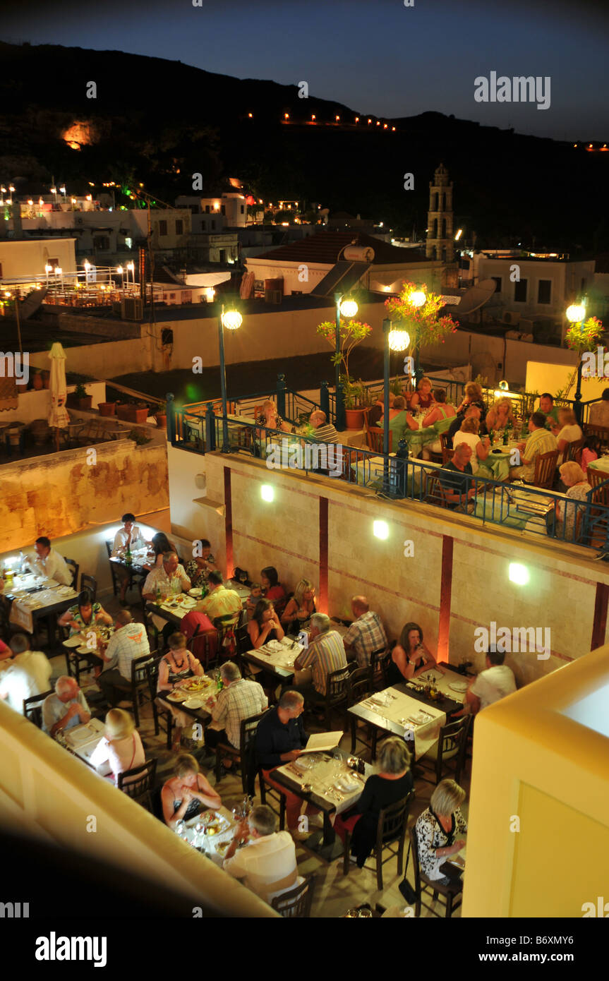Restaurant Lindos town, Rhodes, Greece Stock Photo - Alamy