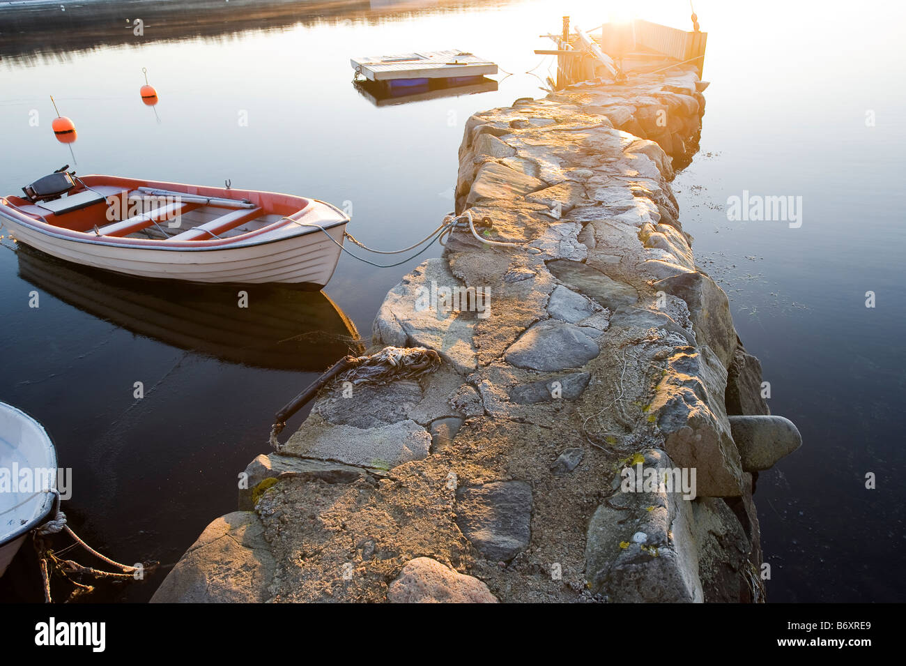 Stone pier with small boats, Onsala peninsula, Sweden Stock Photo - Alamy