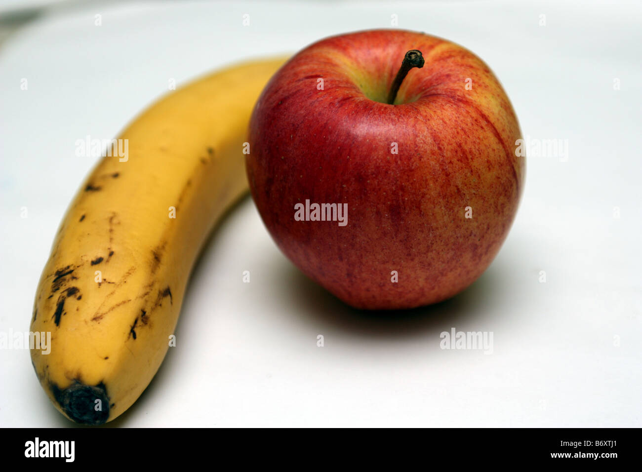 Banana and Apple Stock Photo - Alamy