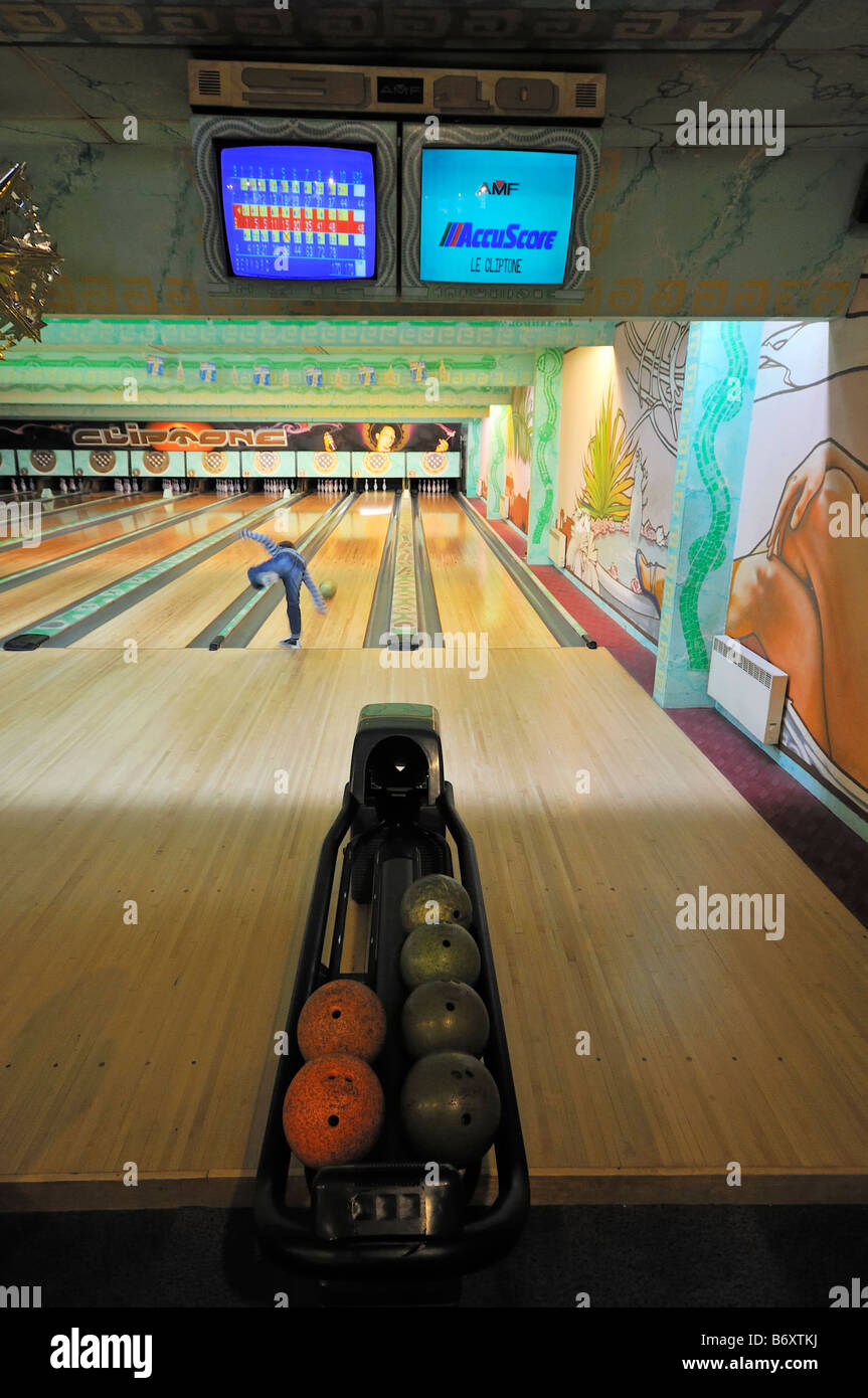 France Coignieres town, young boys playing bowling Stock Photo - Alamy