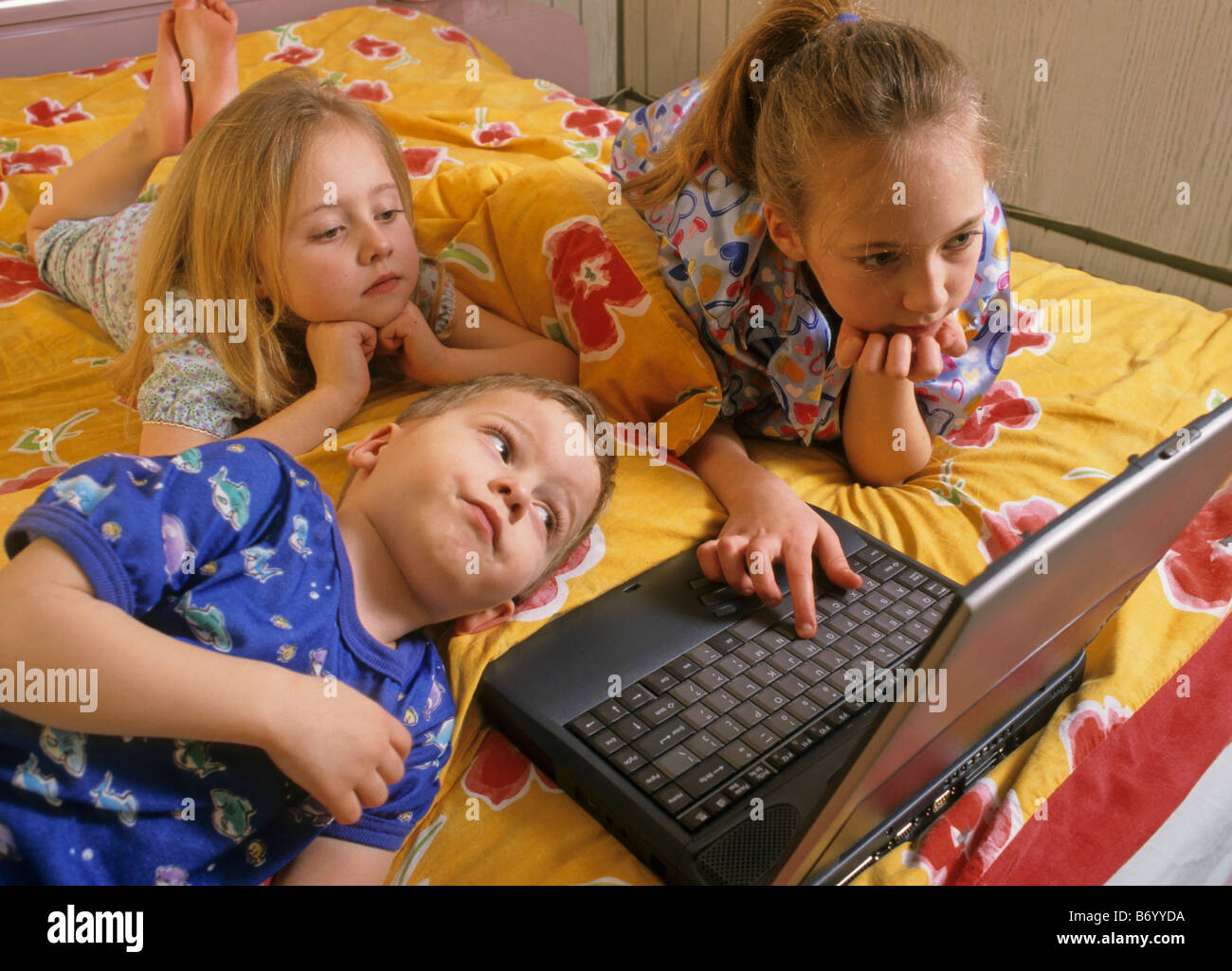 Children with laptop Stock Photo - Alamy