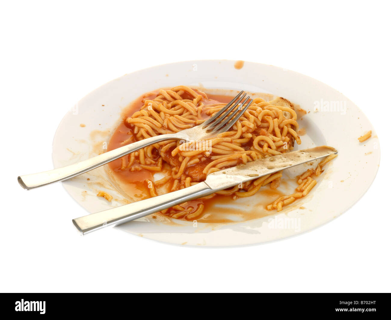 Leftover food on plate Cut Out Stock Images & Pictures - Alamy