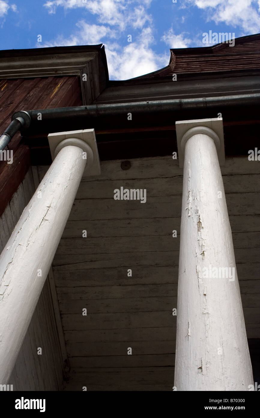 Two columns of a wooden chapel July 2006 Lithuania Stock Photo - Alamy