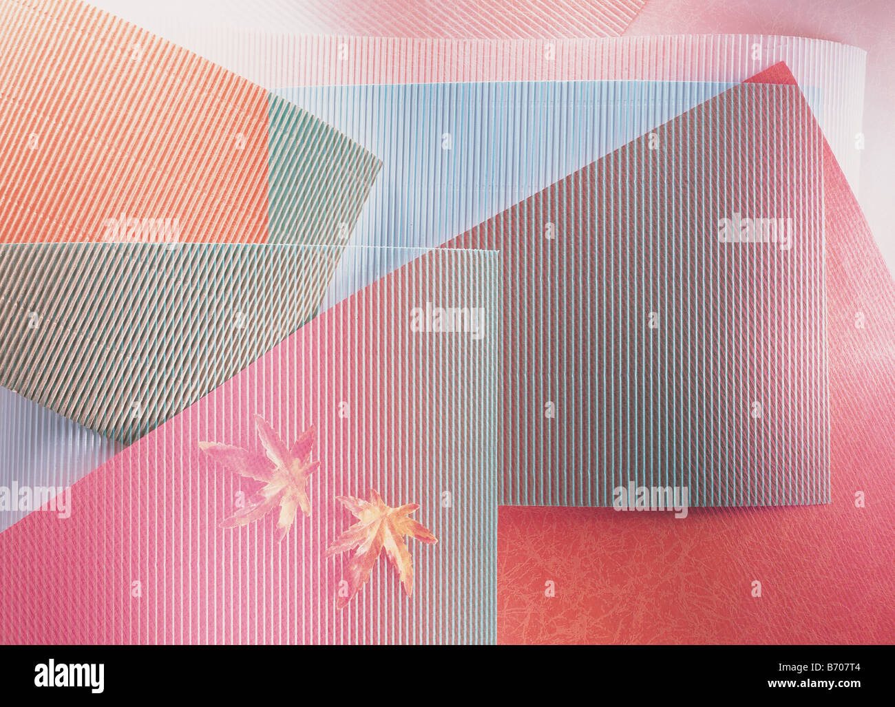 Colorful striped paper and maple leaves Stock Photo - Alamy