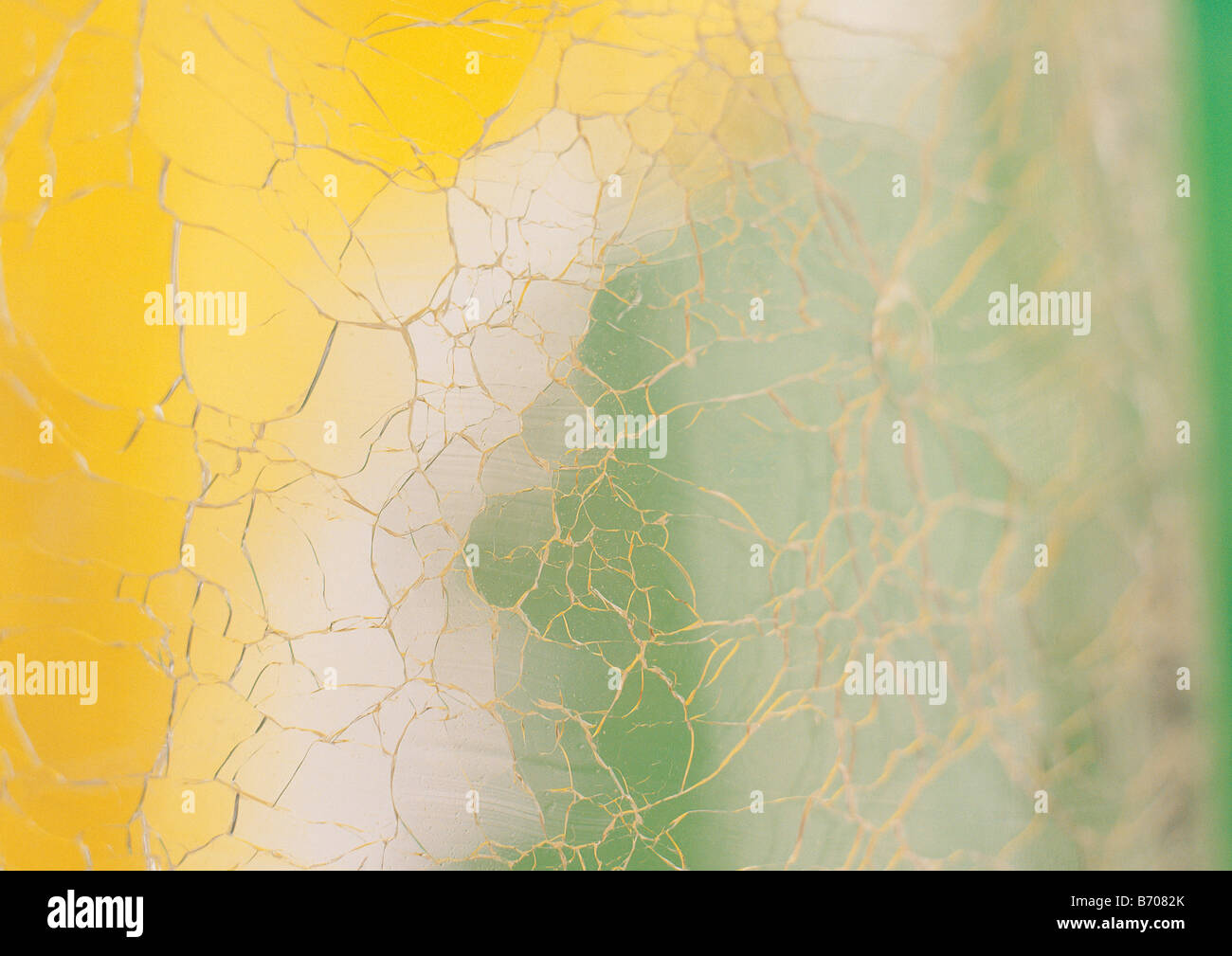 Green and yellow cracked glass Stock Photo - Alamy