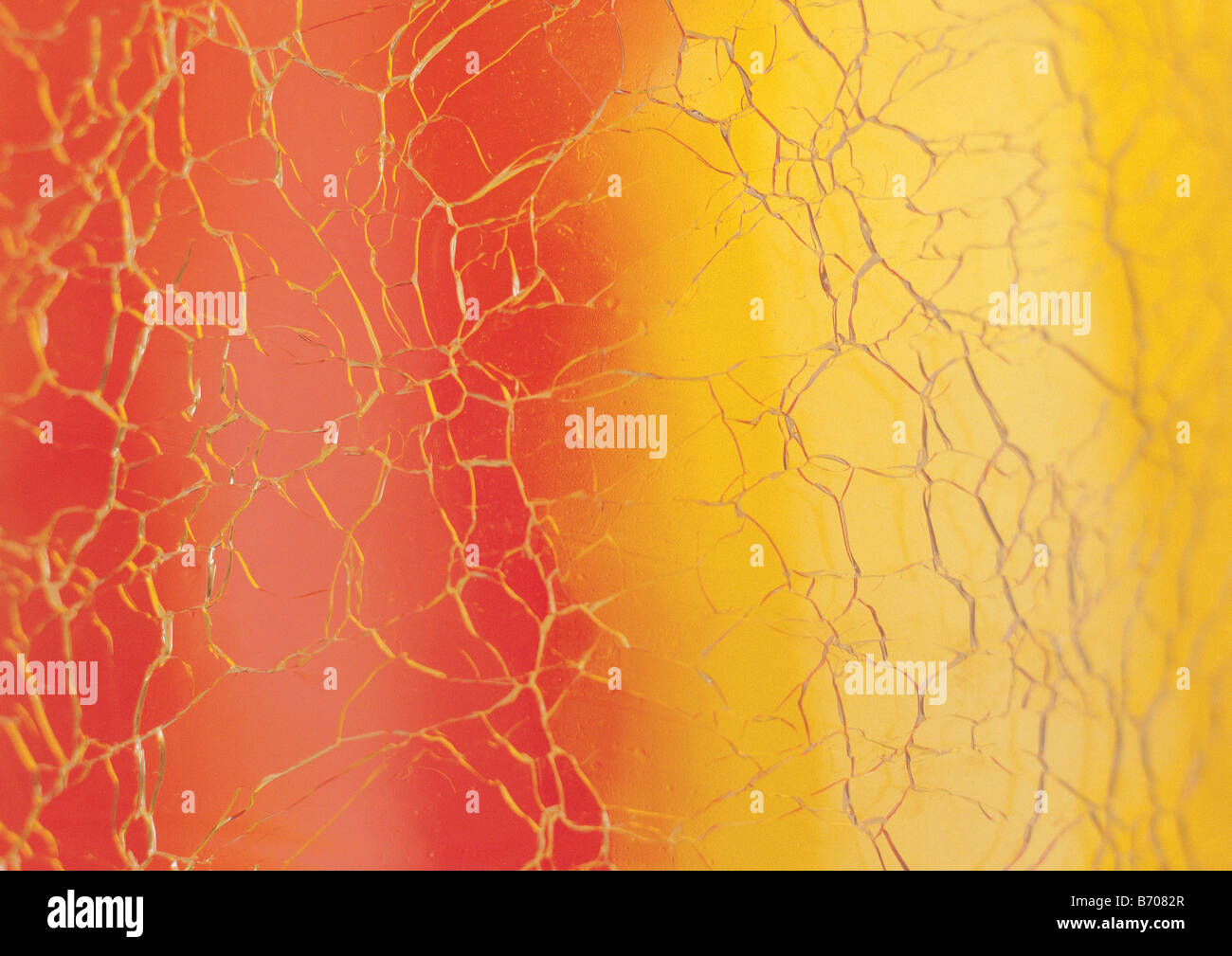 Yellow and red cracked glass Stock Photo - Alamy