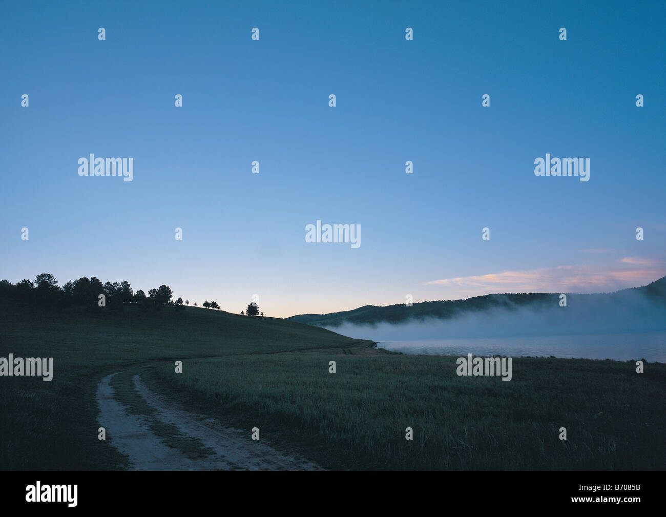 Countryside at dawn Stock Photo - Alamy