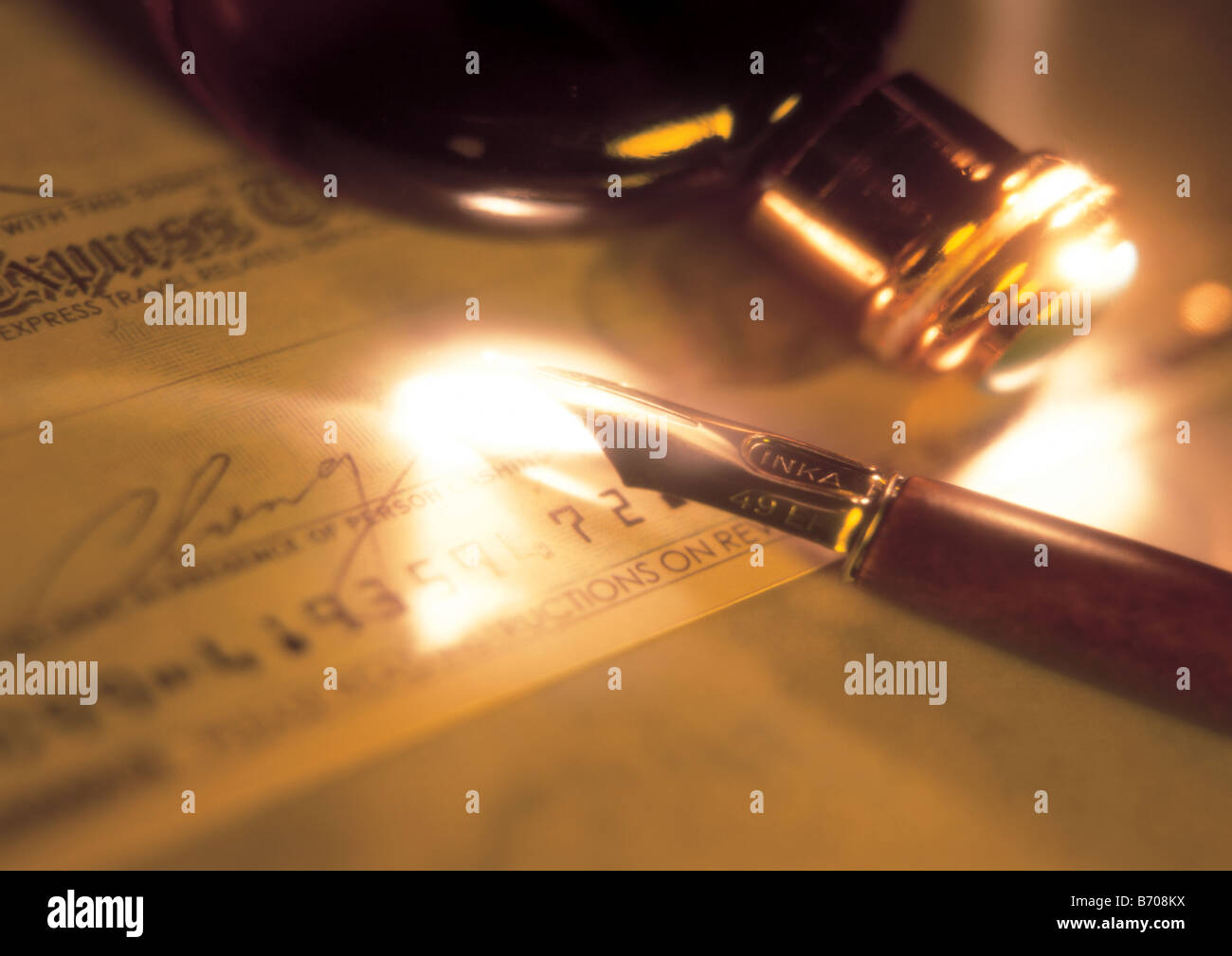 Check and pen Stock Photo - Alamy