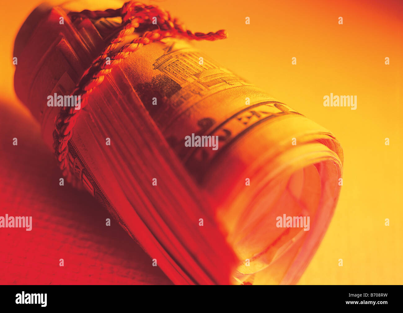 Rolled up money Stock Photo - Alamy