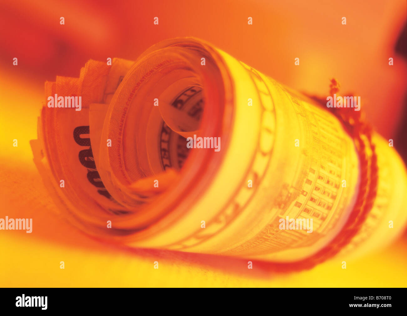 Rolled up money Stock Photo - Alamy