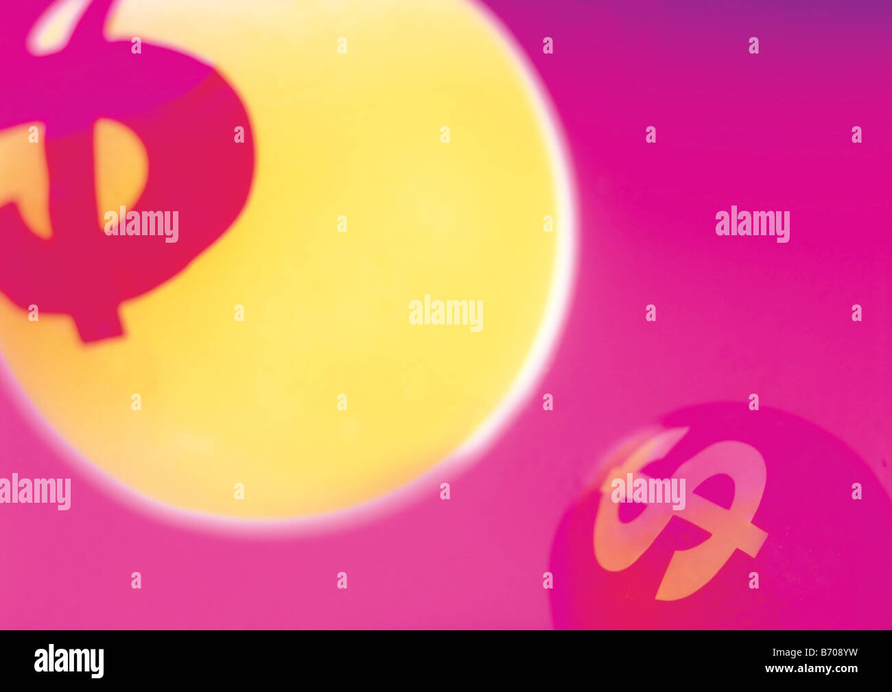 Two balls with dollar signs Stock Photo - Alamy