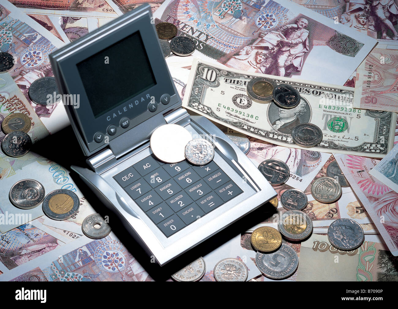 Money and calculater Stock Photo - Alamy