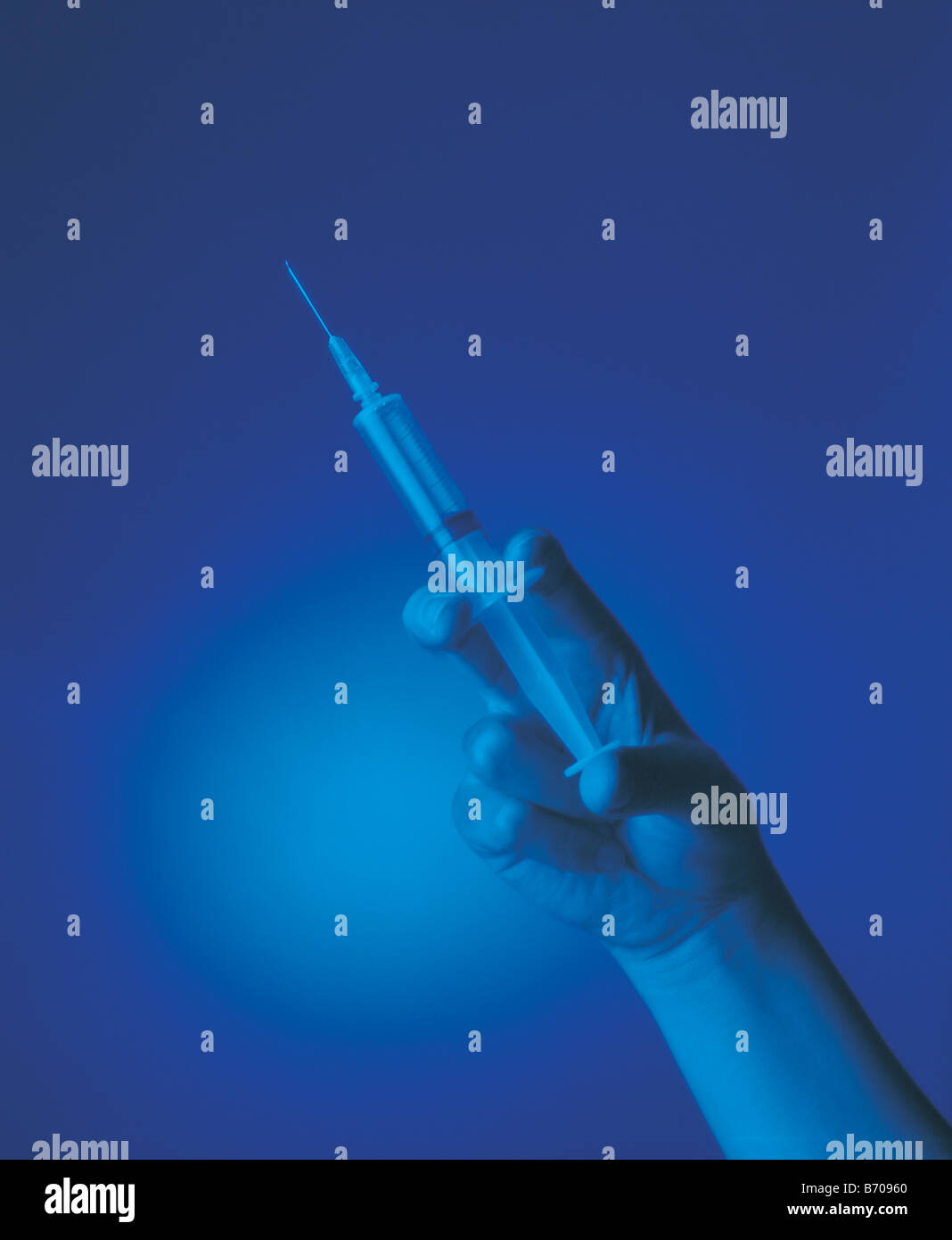 one hand holding needle Stock Photo - Alamy