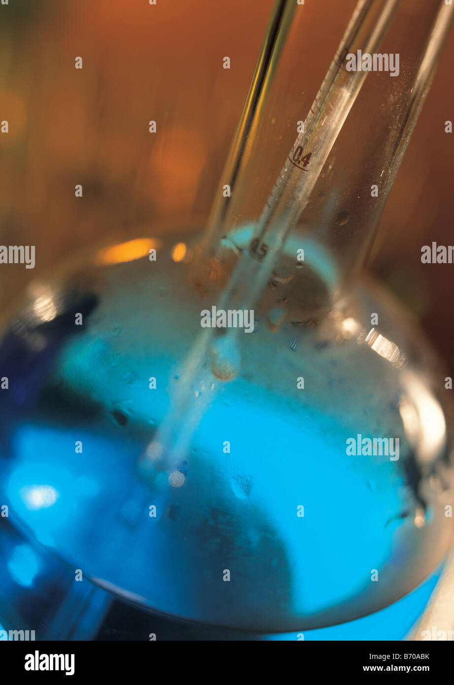 Close-up of beaker and dropper Stock Photo - Alamy