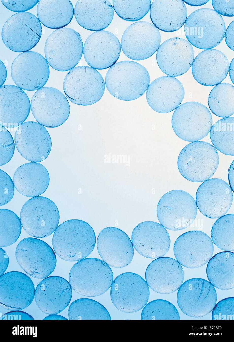 Semitranslucent blue circle crystal form a frame Stock Photo - Alamy