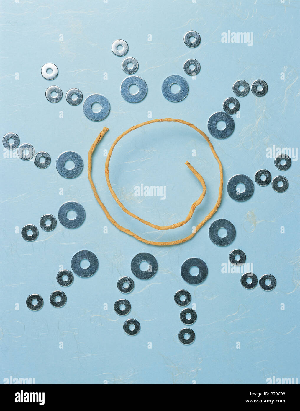 Iron metals form a sun-shape Stock Photo - Alamy