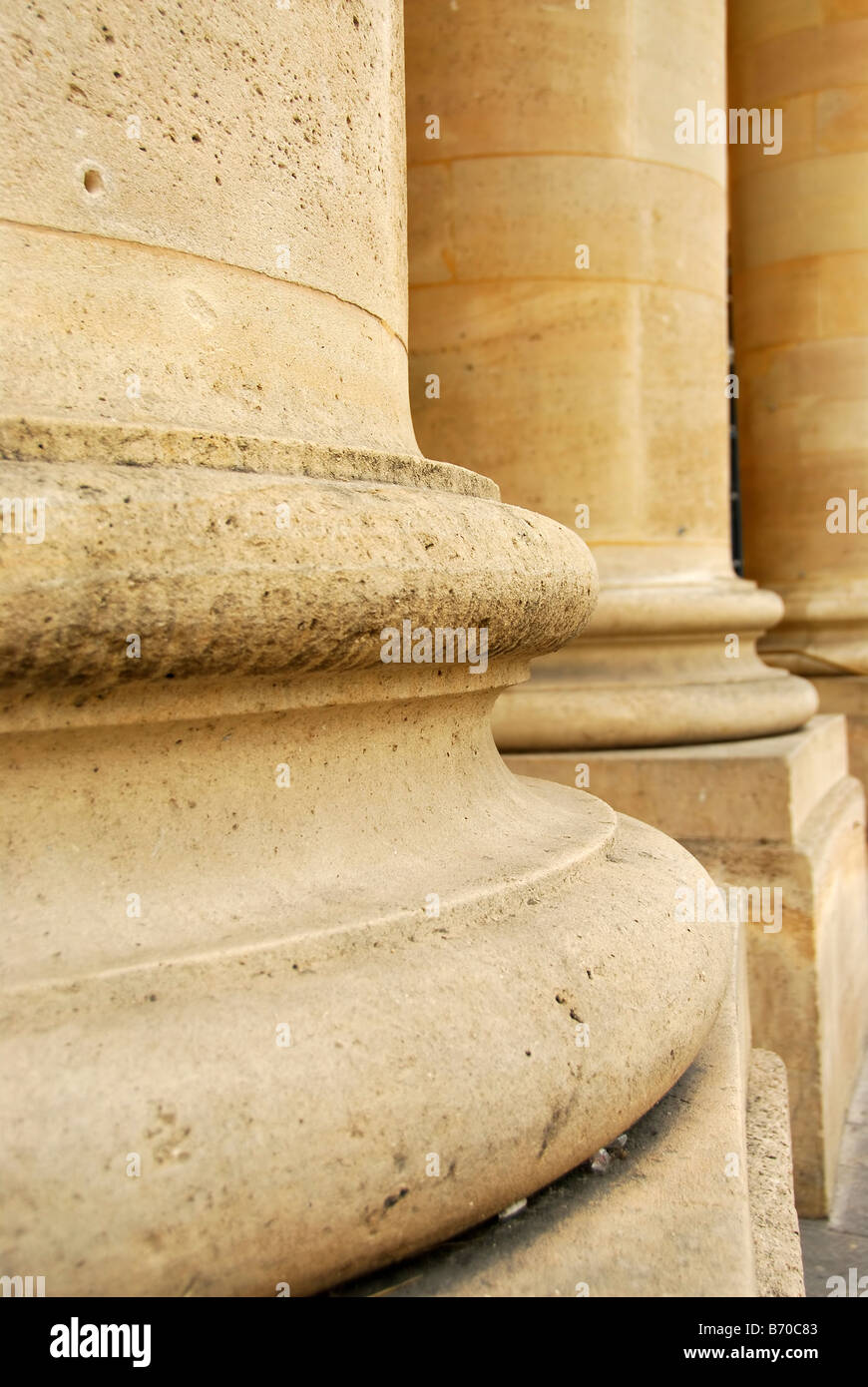 Closeup of row of stone columns in perspective Stock Photo - Alamy