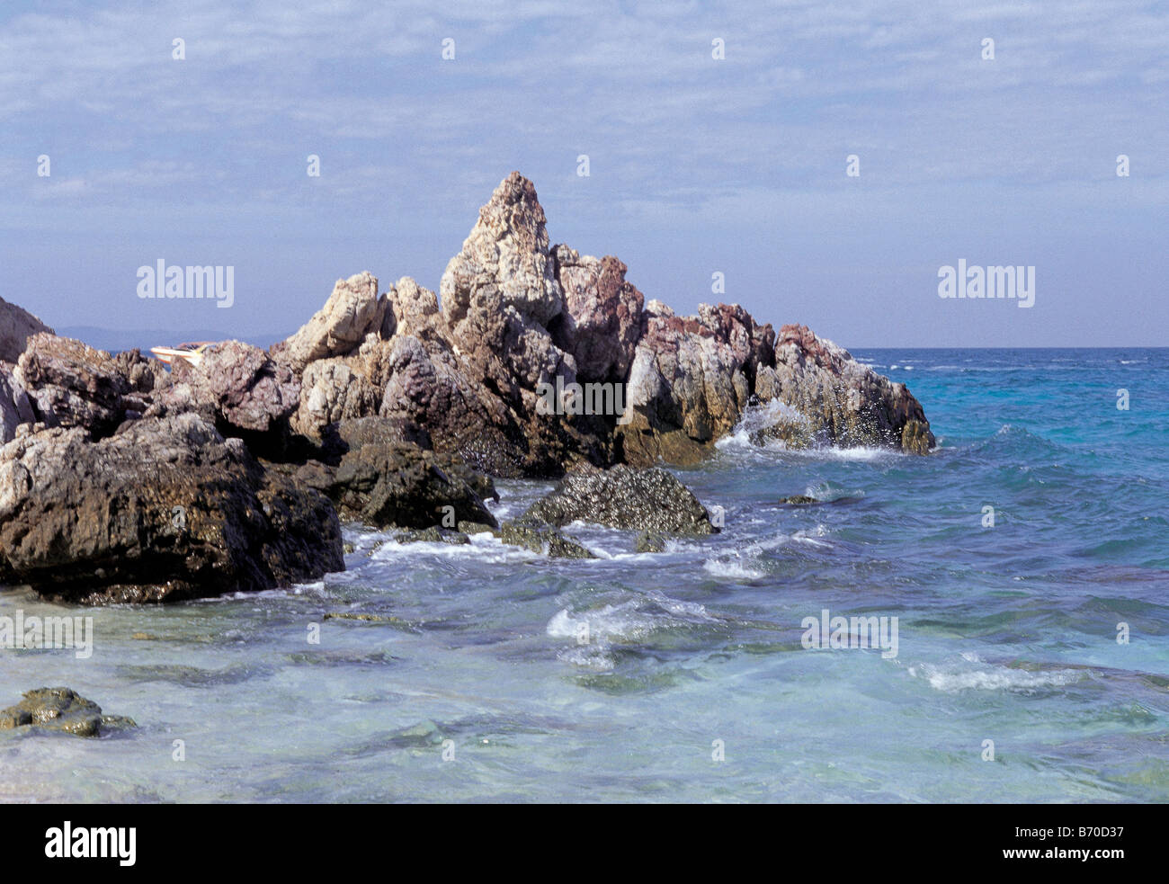 Rocks in the sea Stock Photo - Alamy