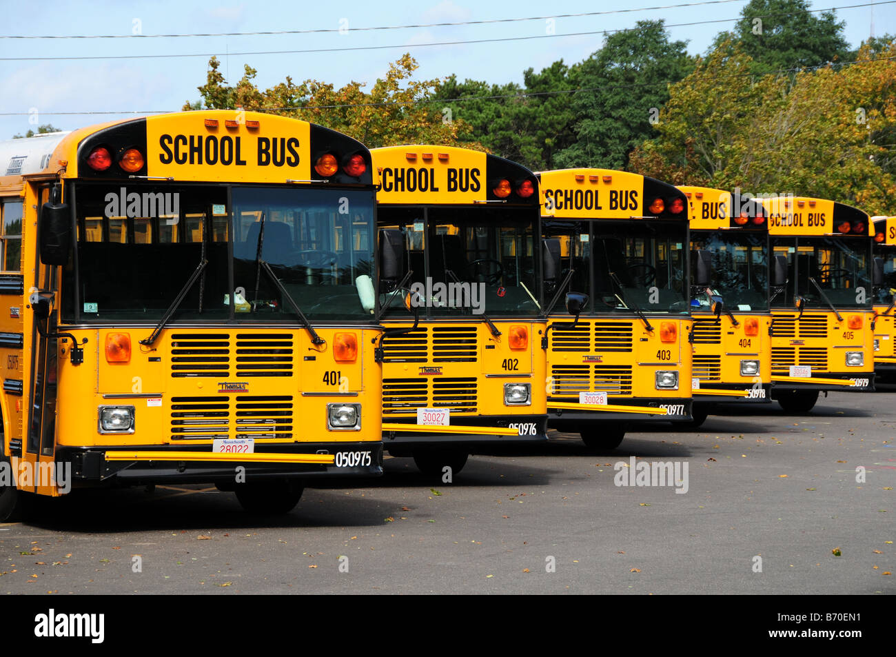 School buses line up hi-res stock photography and images - Alamy