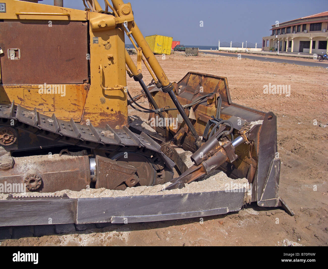 Bulldozer starting the ground work for a new hotel next to Koto beach ...