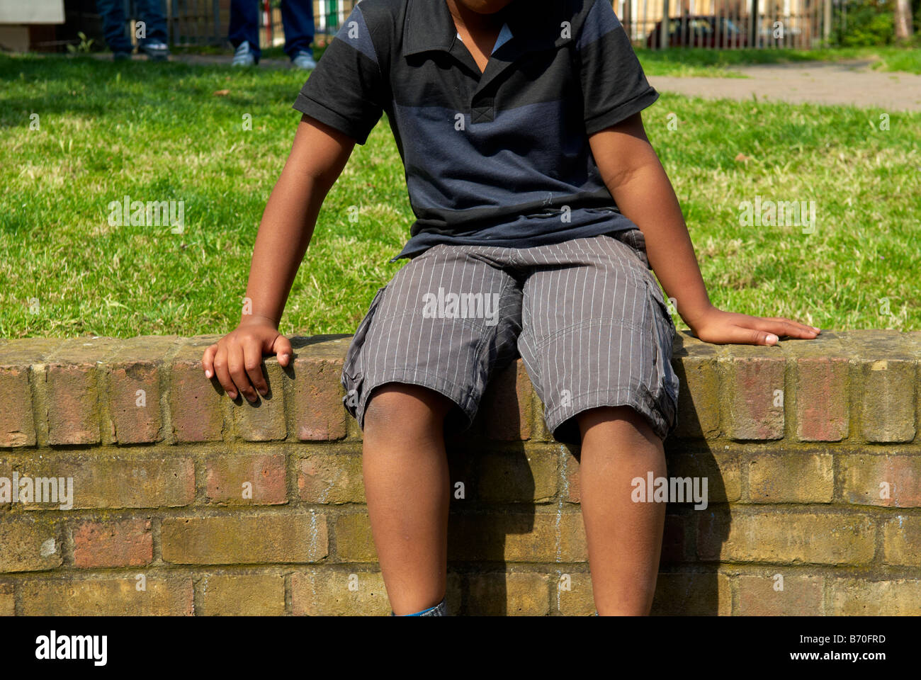 Boy facing wall hi-res stock photography and images - Alamy